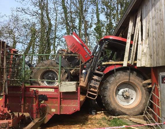 Farmer thrown out of a tractor before it smashed into a cattle shed is ...