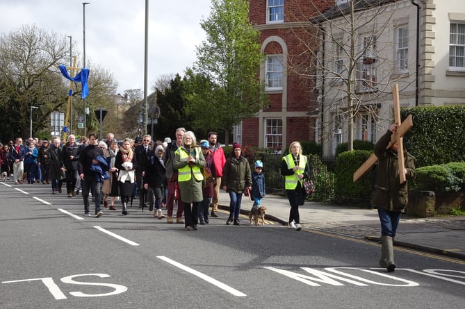 Walk of Witness tradition kept alive as cross carried through town ...