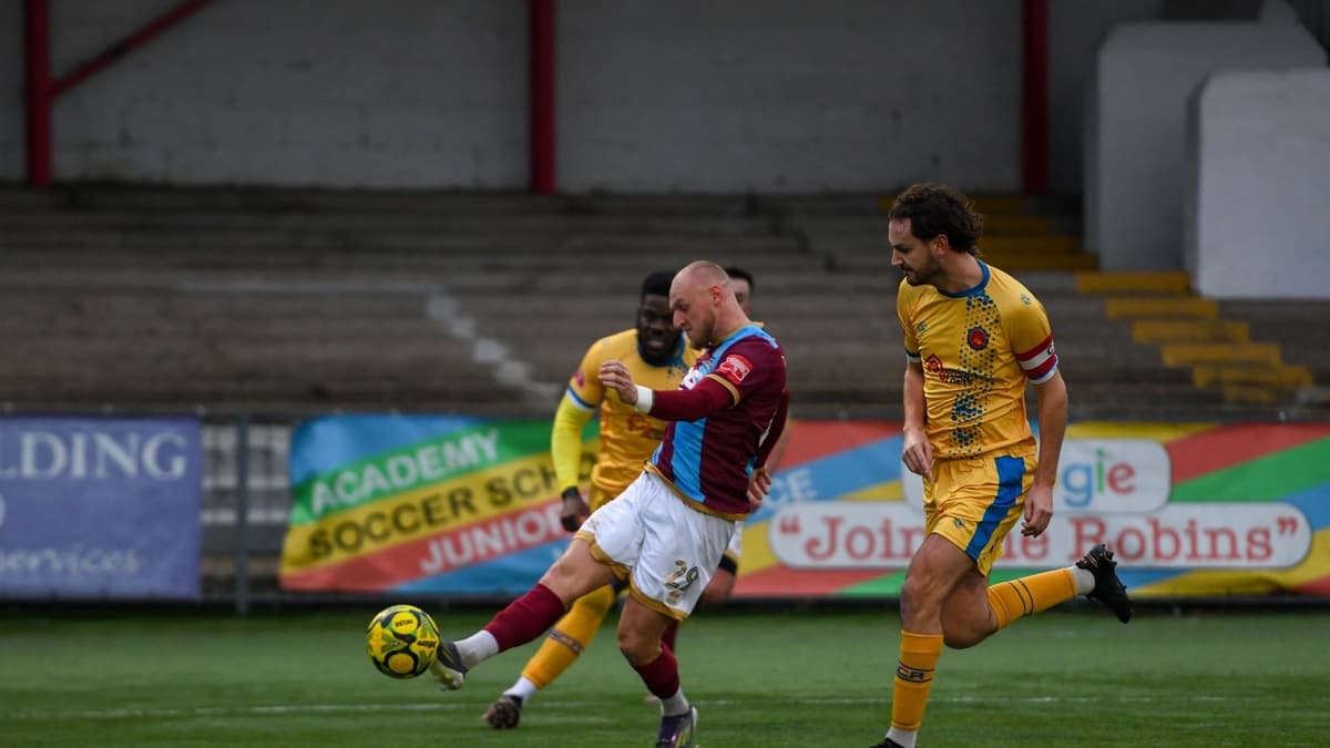 League leaders Town return to action with solid away win ...